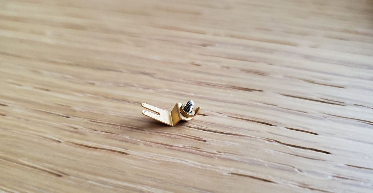 Omega Beta 21: Battery retaining prong/screw has extra spacer!! | Omega ...