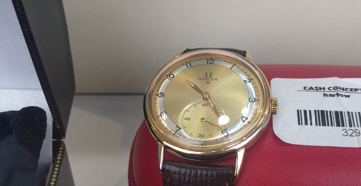 Omega red star - assuming this is a fake? | Omega Watch Forums