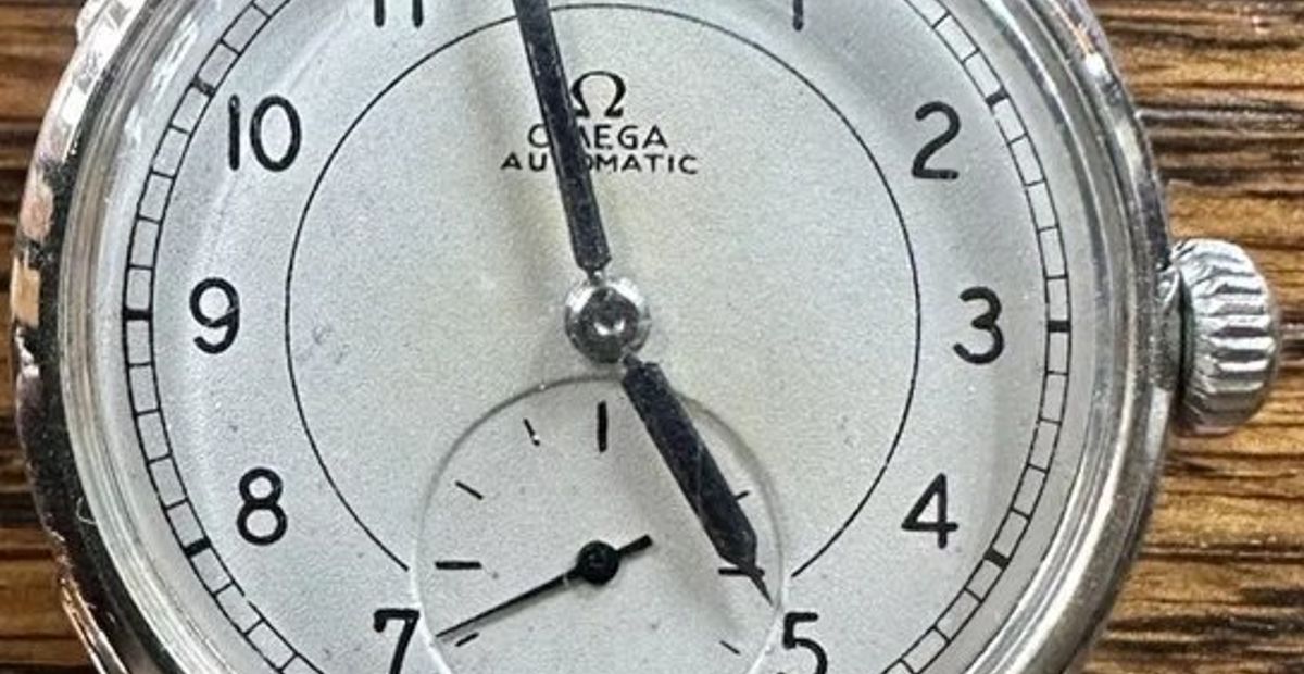 Help: identification and whether it's redial | Omega Watch Forums