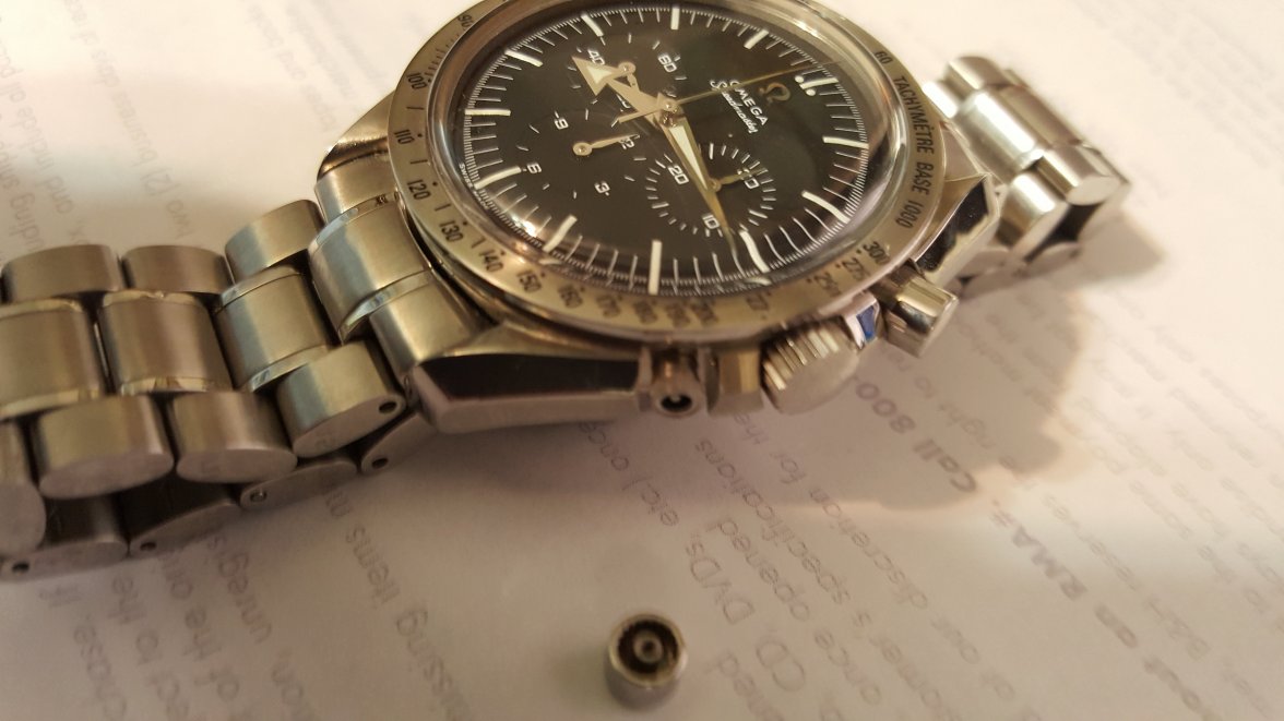 Do real Omega Speedmaster's pusher buttons fall off easily? (edited ...
