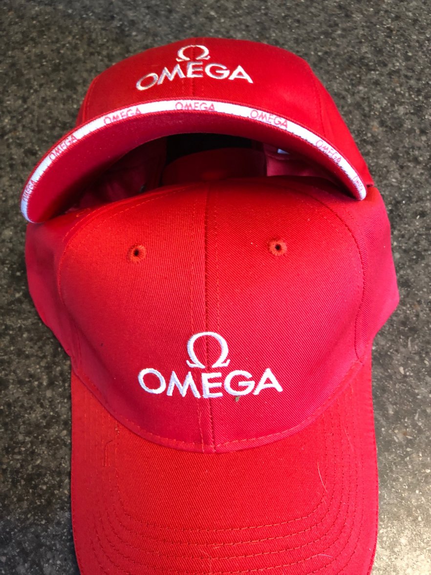 SOLD - Omega caps - FREE | Omega Forums